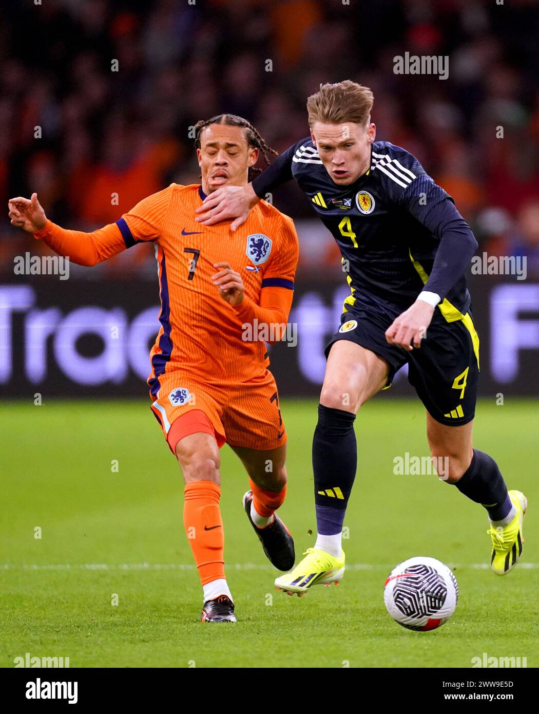 Scotland's Scott McTominay (right) and Netherlands' Xavi Simons battle ...