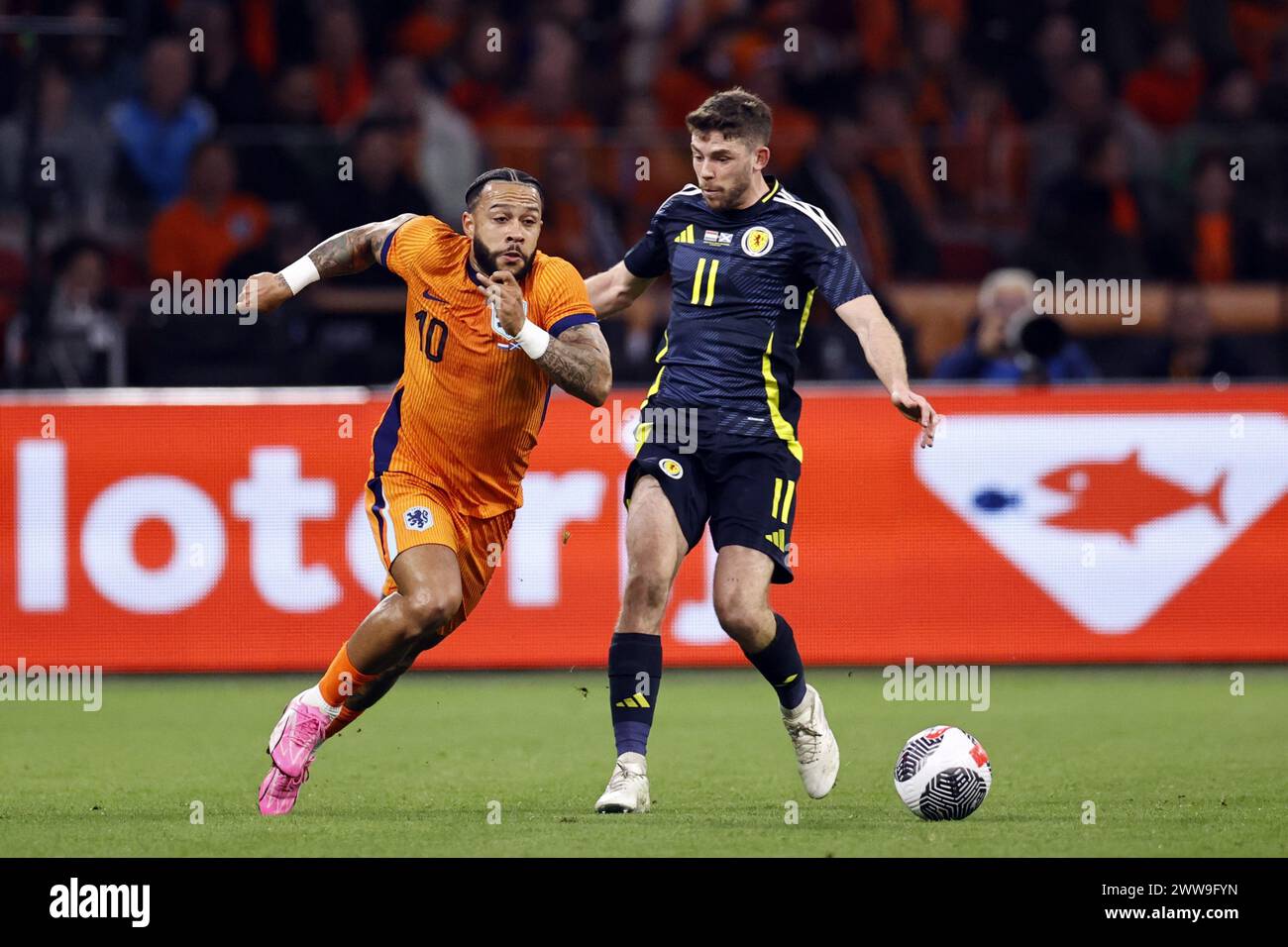 AMSTERDAM - (l-r) Memphis Depay of Holland, Ryan Christie of Scotland ...