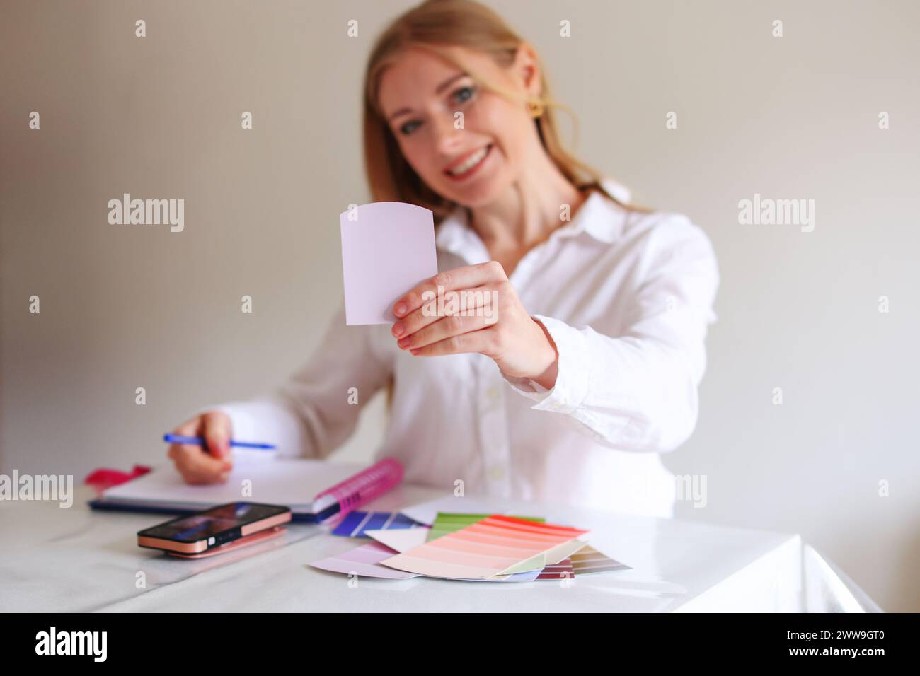 girl interior designer hold color palette, focus on a palette Stock ...
