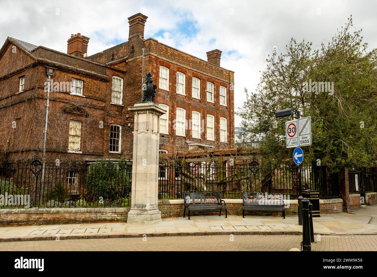 Colchester, Essex, UK – March 18 2024. Ornate lion statue in front of a ...