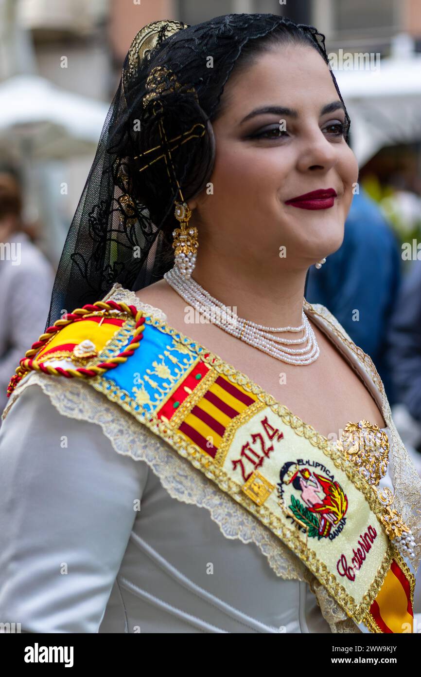 Valencian Grace at the Heart of Fallas; A Fallera’s attire, adorned ...