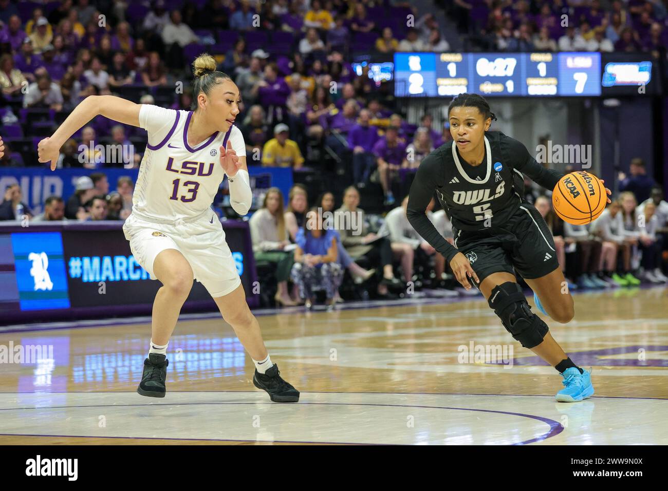 Baton Rouge, LA, USA. 22nd Mar, 2024. Rice's Destiny Jackson (5) tries ...
