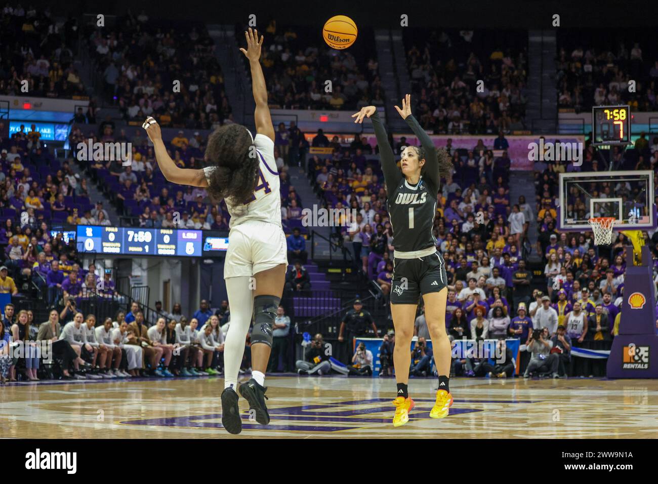 Baton Rouge, LA, USA. 22nd Mar, 2024. Rice's Malia Fisher (1) puts up a ...
