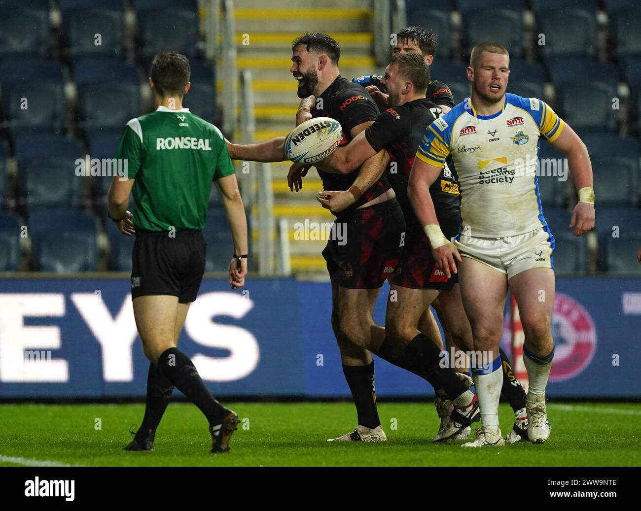 St Helens' Alex Walmsley celebrates after scoring a try during the ...