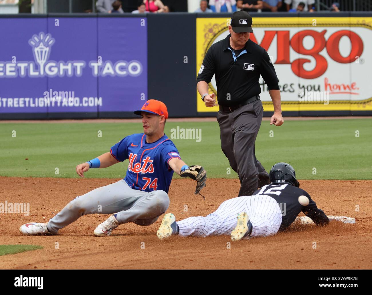 Tampa, United States. 22nd Mar, 2024. Yankees' Trent Grisham steals ...