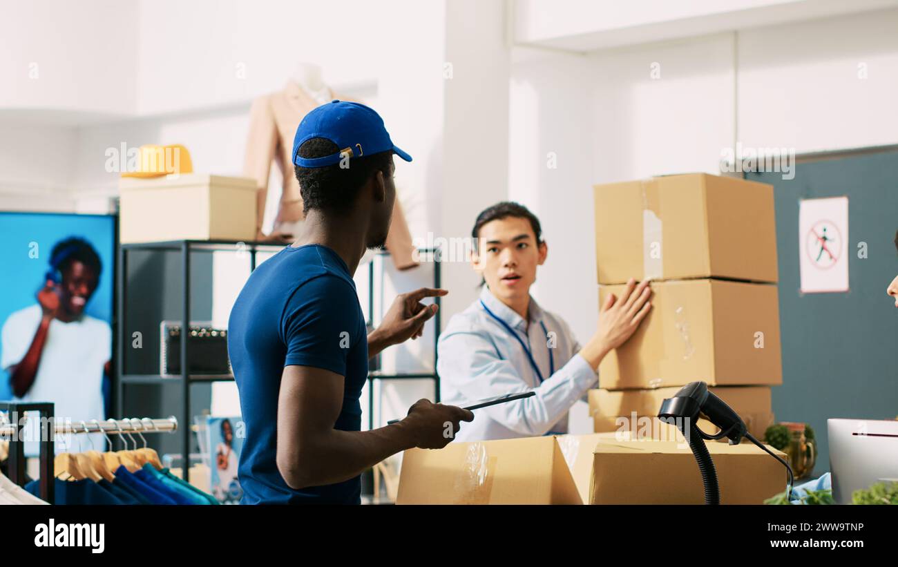 African american courier discussing hi-res stock photography and images ...