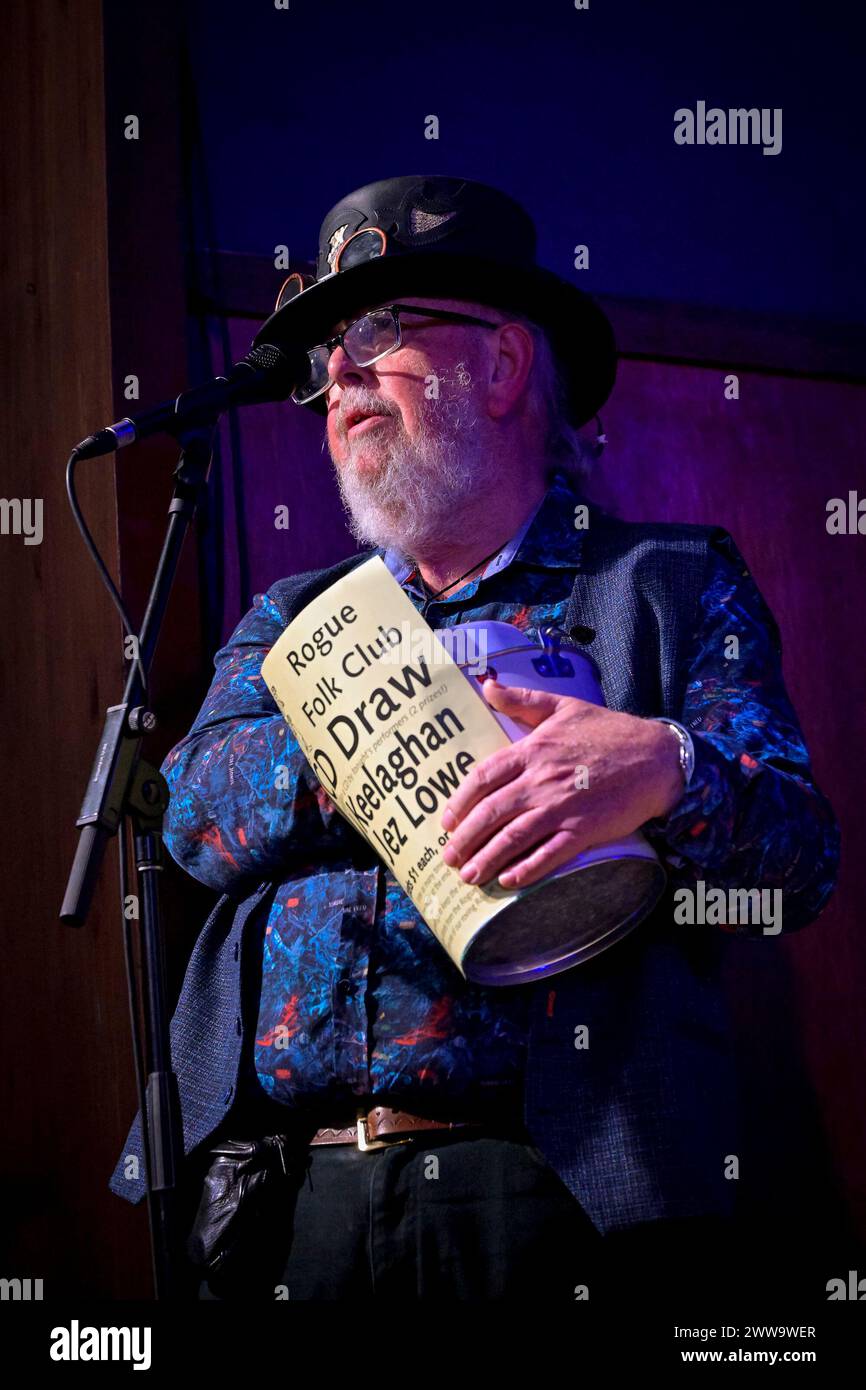 Rogue Folk Club Artistic Director, Steve Edge draws raffle ticket Stock ...