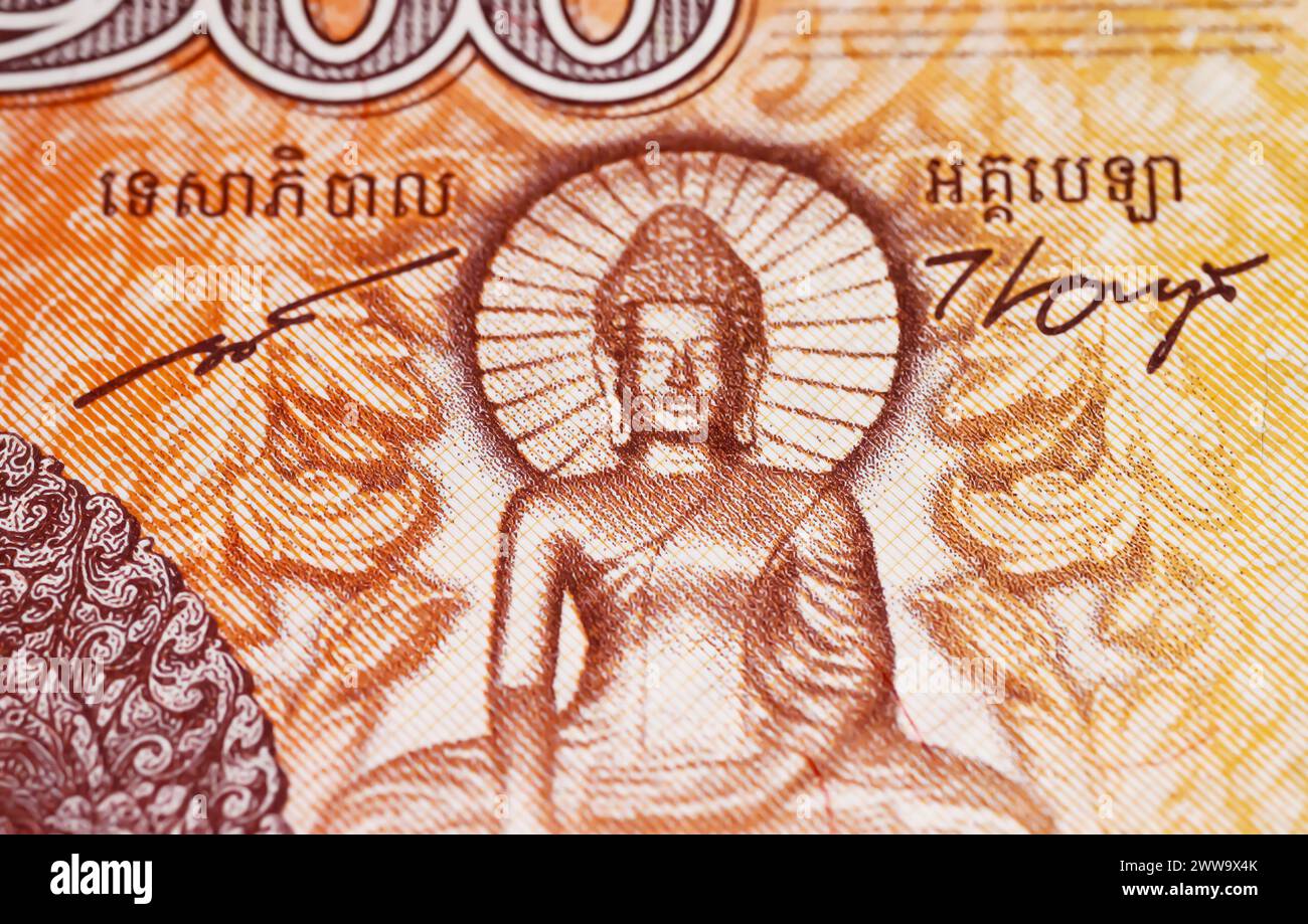 Buddha statue on Cambodia 100 Riel currency banknote (focus on center ...