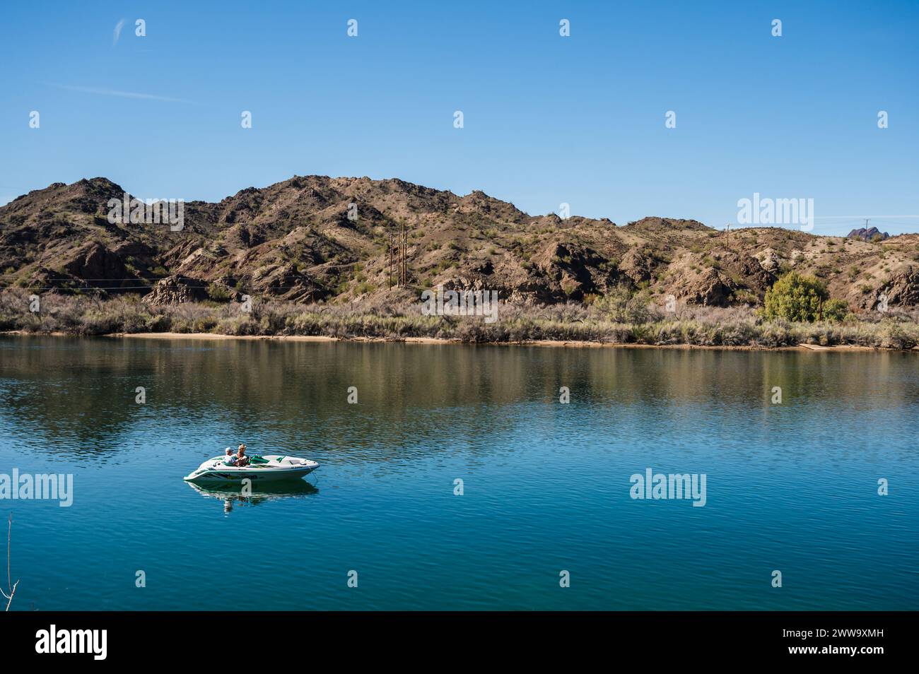 A couple in a boat along the Colorado River below the Parker Dam ...