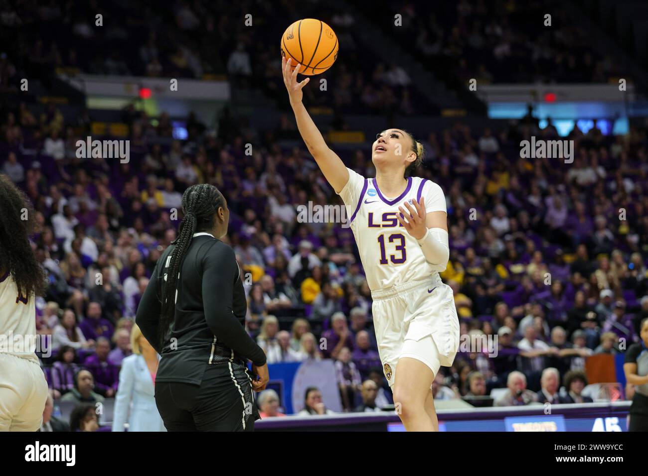Baton Rouge, LA, USA. 22nd Mar, 2024. LSU's Last-Tear Poa (13) is ...