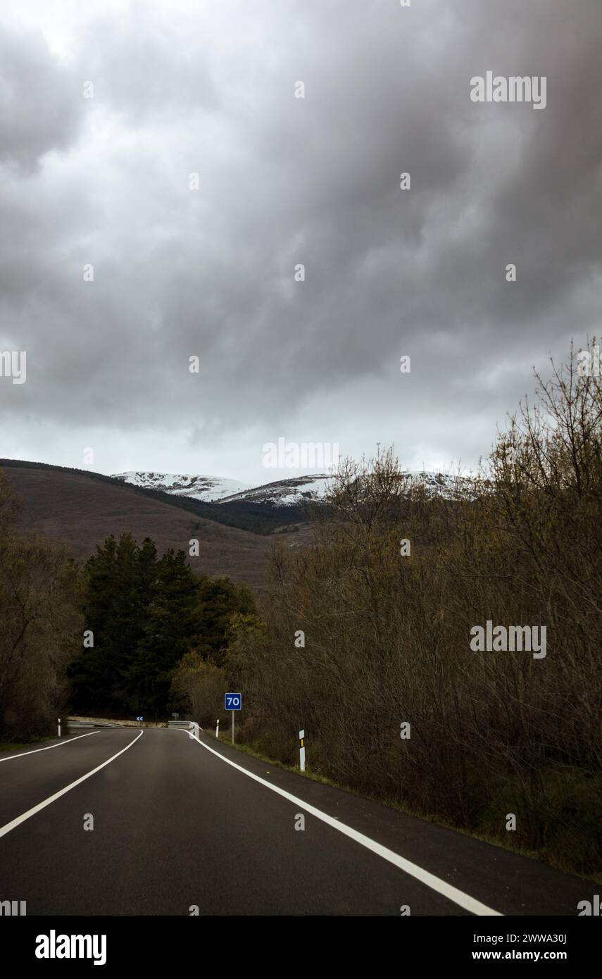 Empty misty road through winter forest. Scenic picturesque route. Sense ...