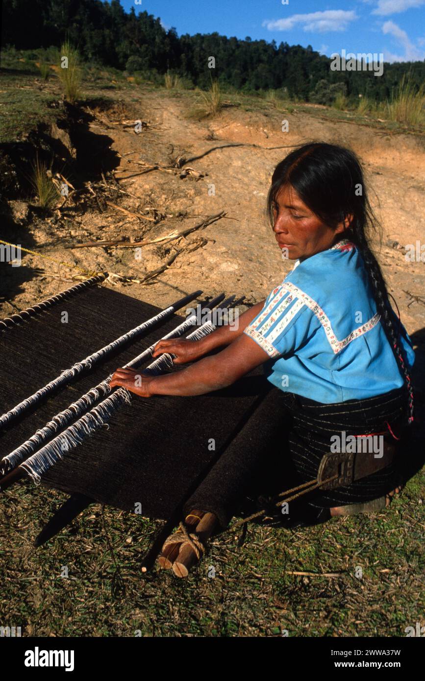 Tzotzil speaking Maya Indian woman from San Juan Chamula weaves ...