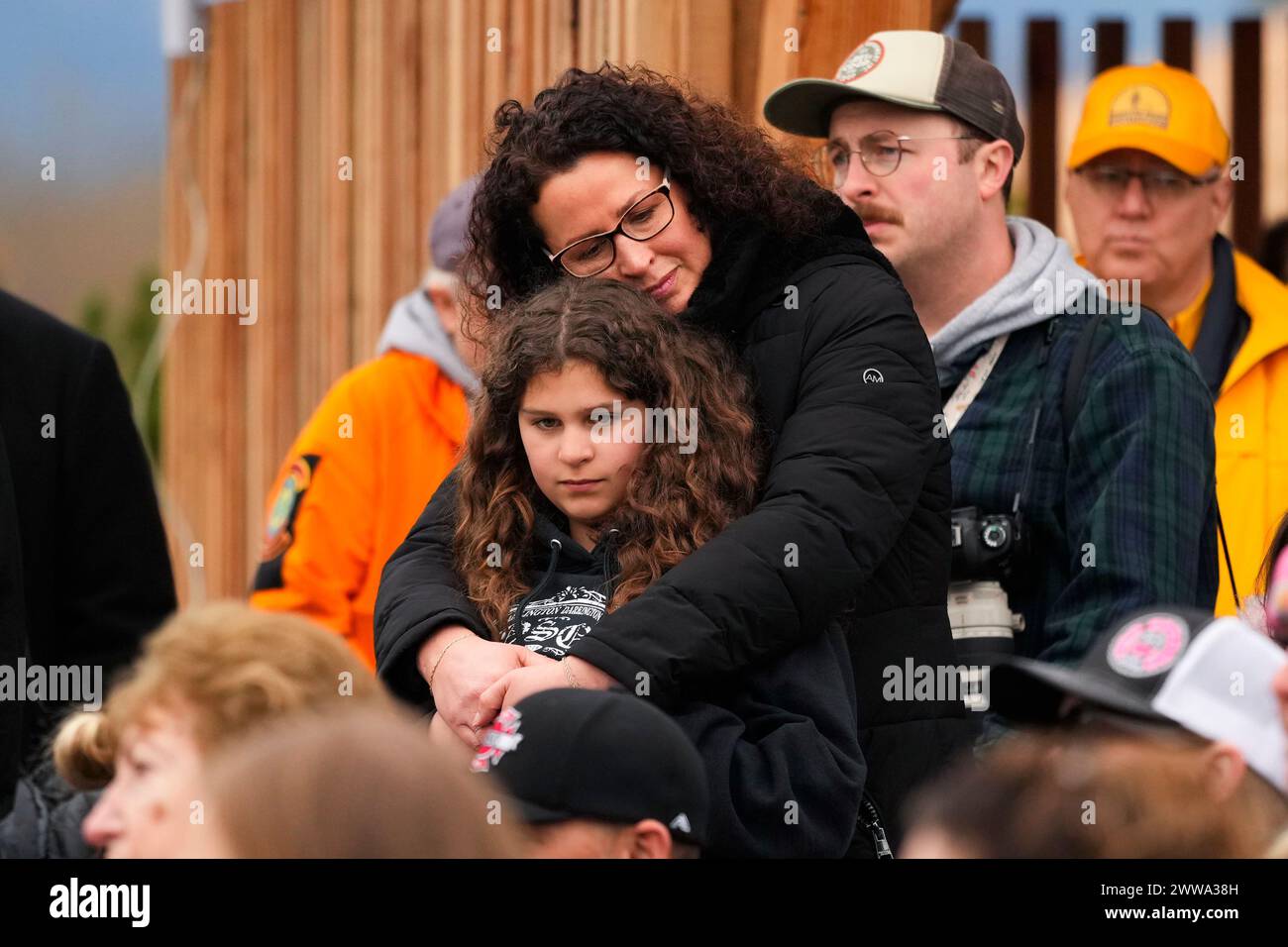 Jenny Hyde hugs her daughter Hazel, 12, during the Oso Landslide ...