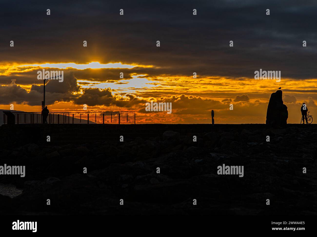 Orange sunset in Salthill Galway Stock Photo - Alamy