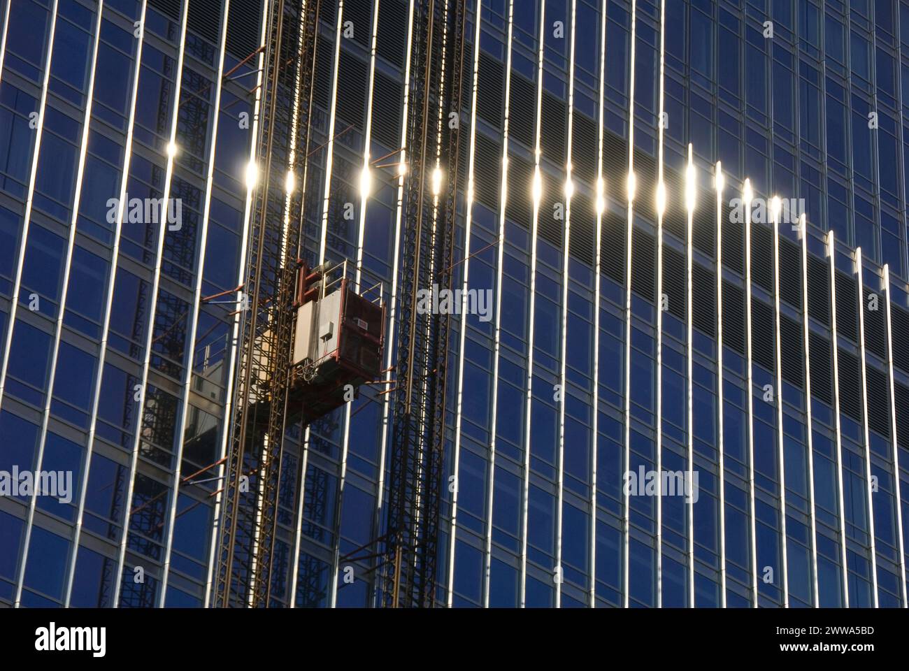 elevators on side of glass tower during construction of Trump Tower ...