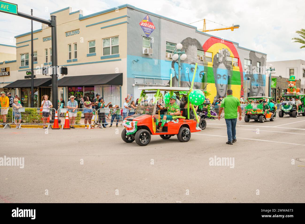 Hollywood, FL, USA - March 10, 2024: People and floats at the St ...