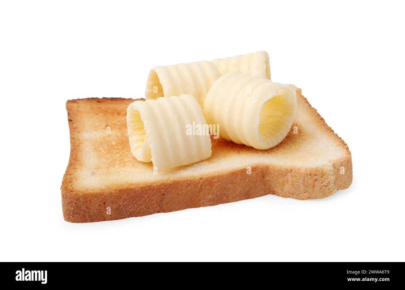 Tasty butter curls and toast isolated on white Stock Photo - Alamy