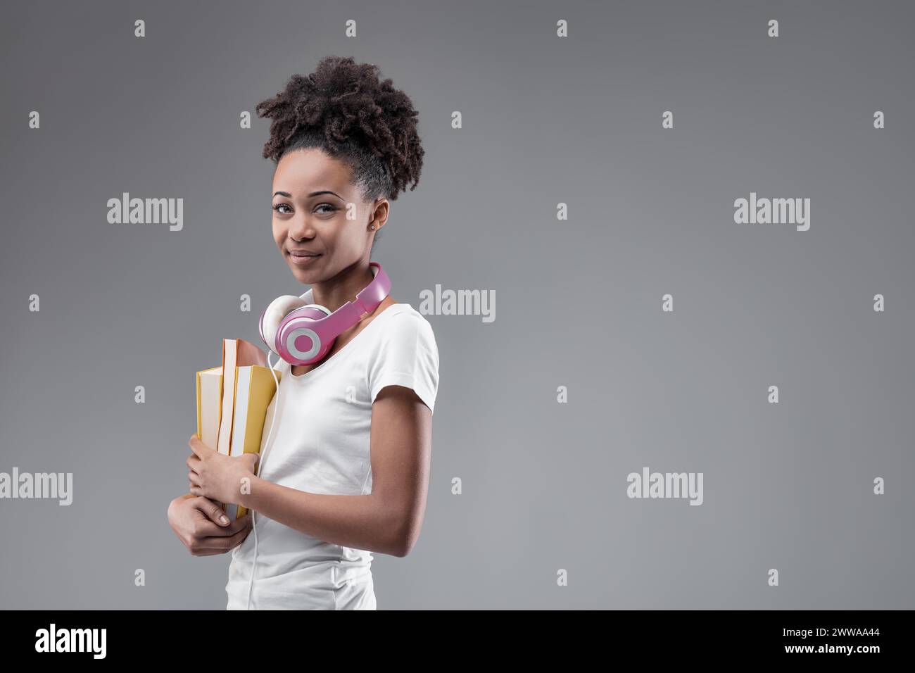 The determined student, with her study materials, embodies commitment ...