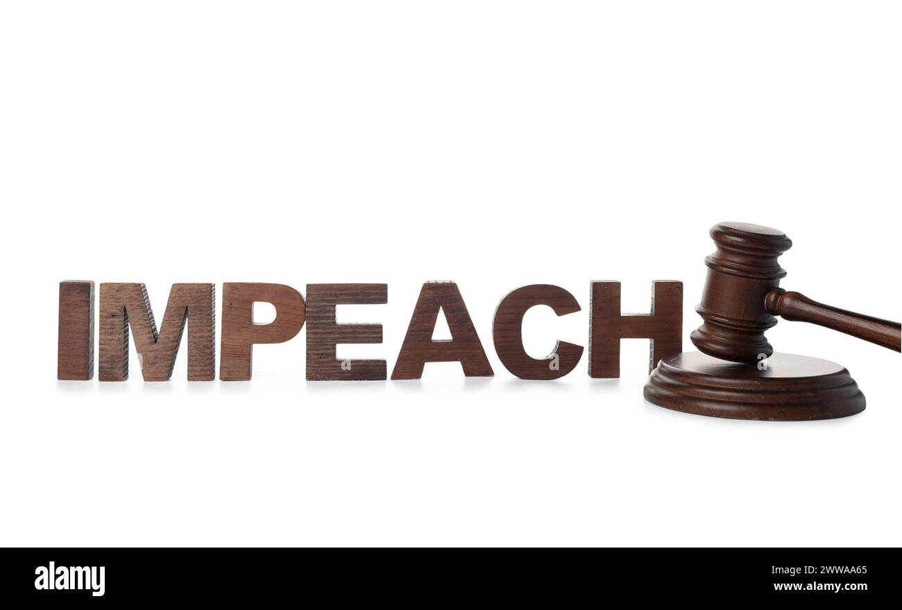 Wooden letters spelling word IMPEACHMENT and judge's gavel on white ...