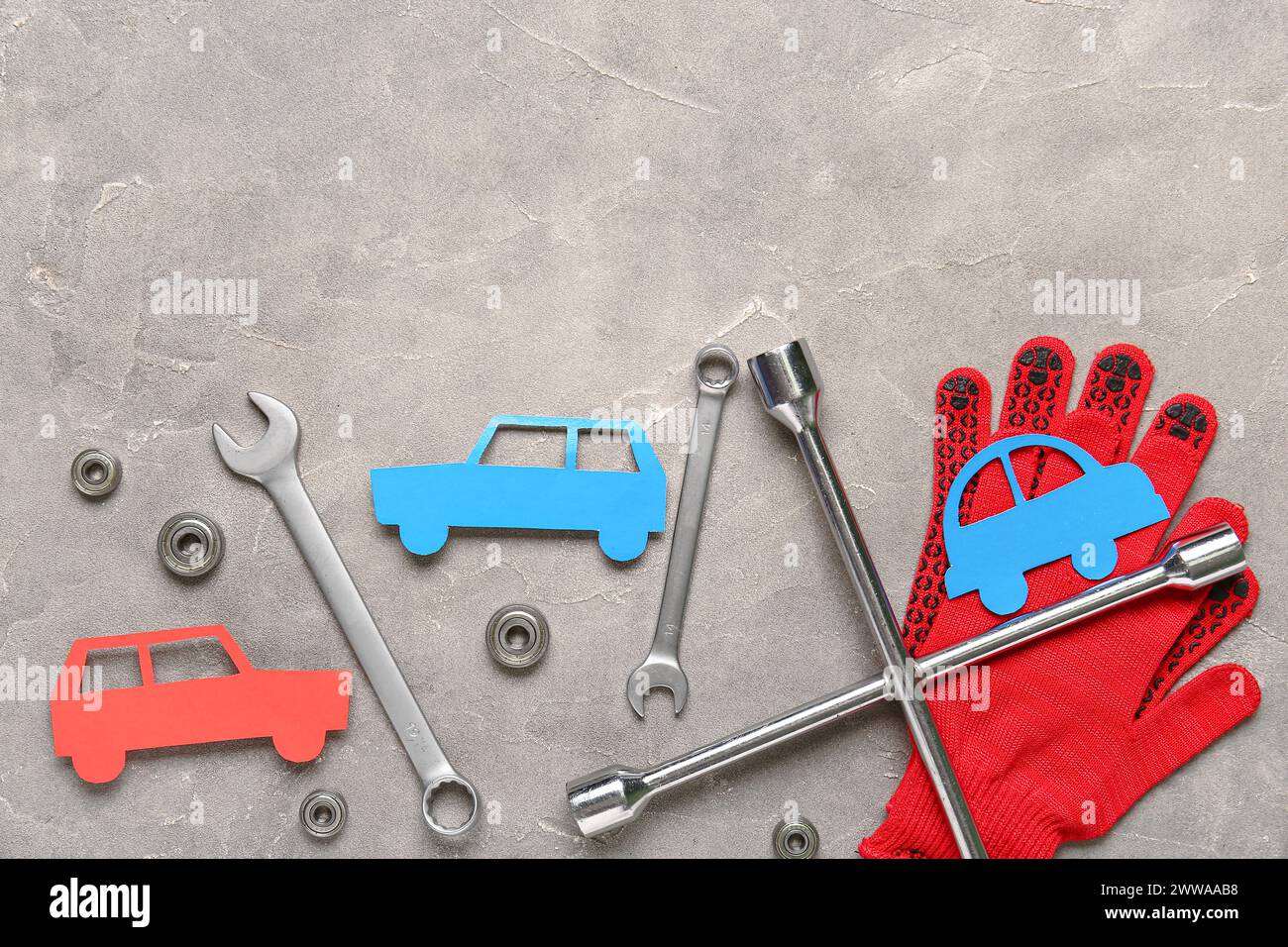 Set of mechanic instruments and toy cars on grunge background. Mechanic ...