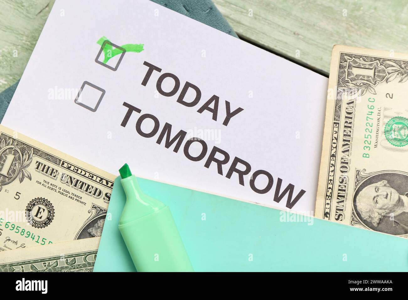 Paper with text TODAY, TOMORROW, money and notebook on green wooden ...