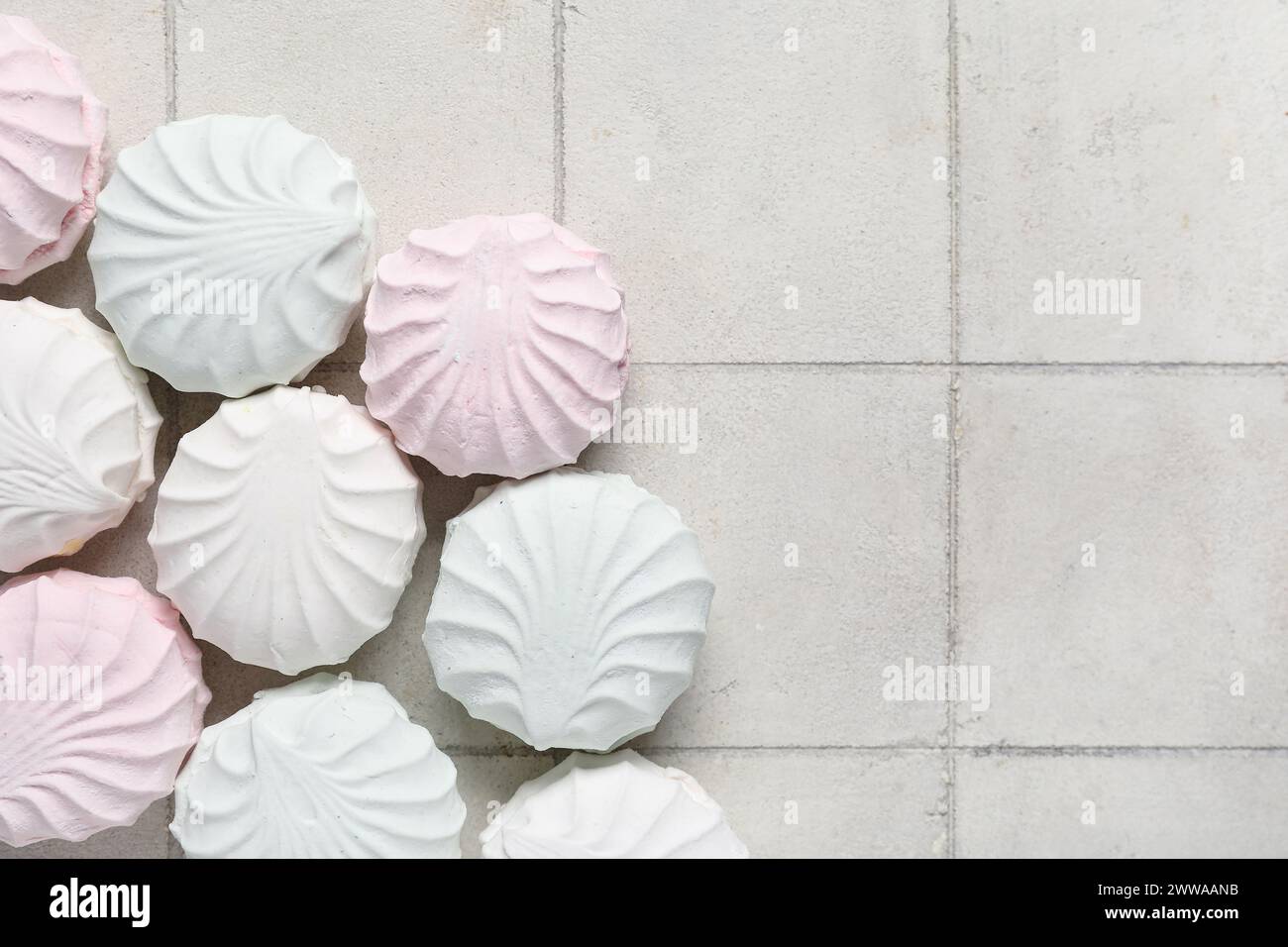 Sweet zefirs on light background Stock Photo - Alamy