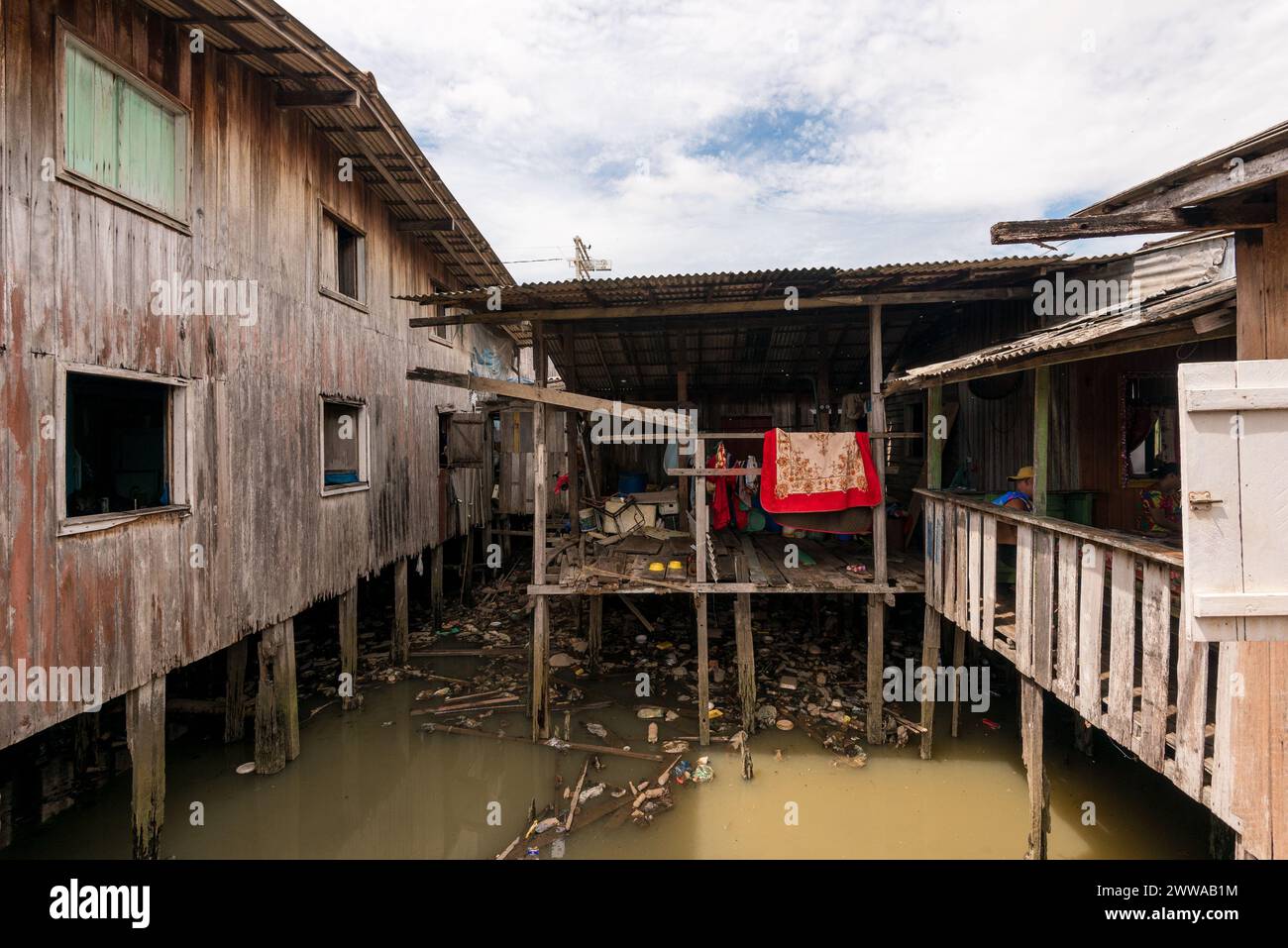 Wooden Houses of the Slum Built Above Water in Poor Neighborhood of ...