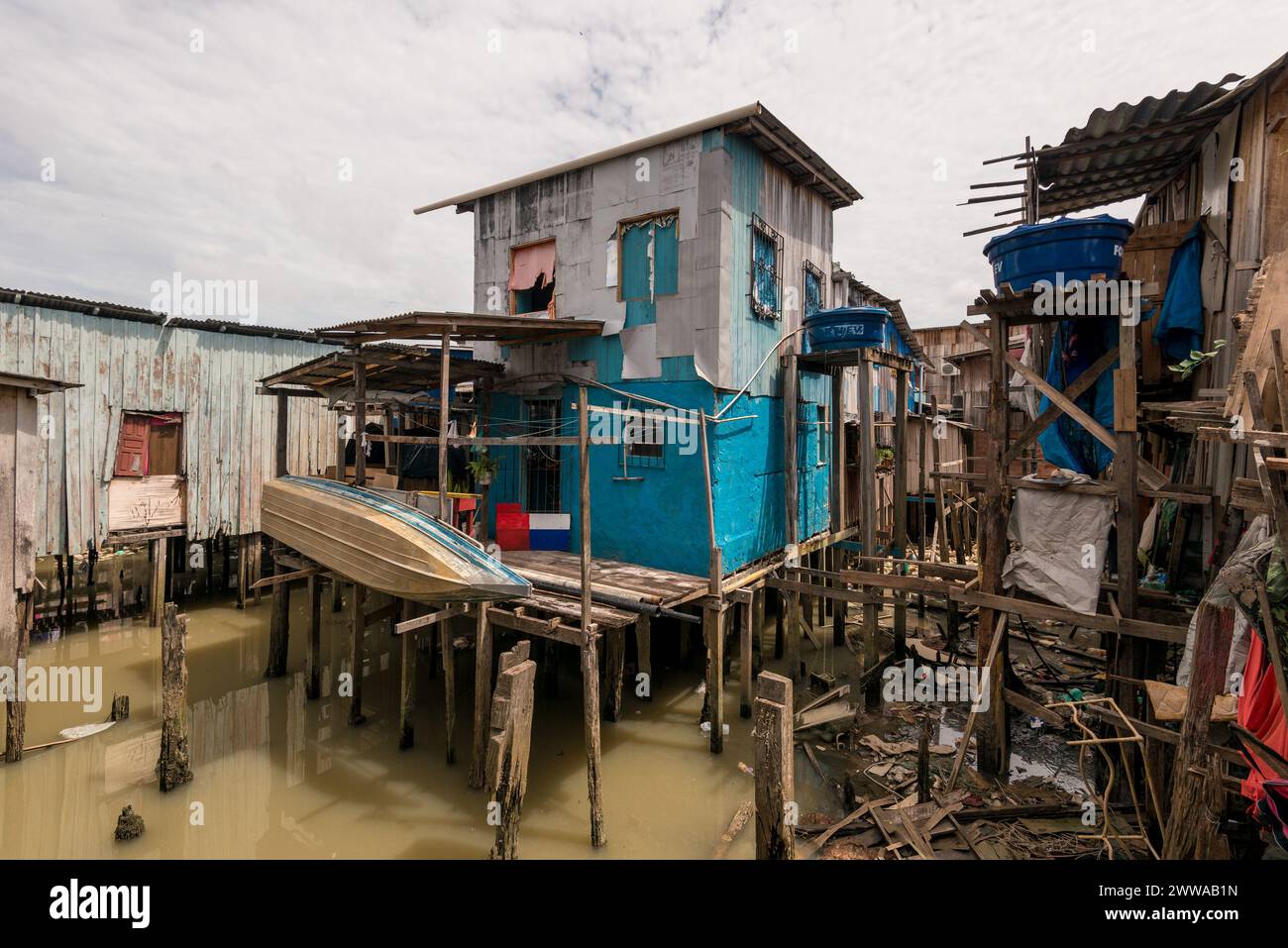 Wooden Houses of the Slum Built Above Water in Poor Neighborhood of ...