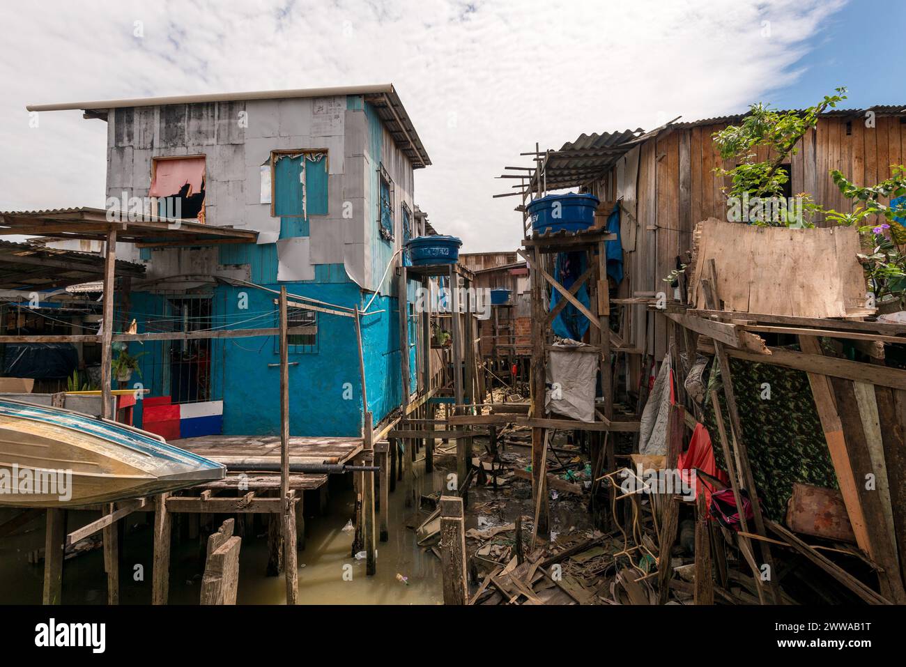 Wooden Houses of the Slum Built Above Water in Poor Neighborhood of ...