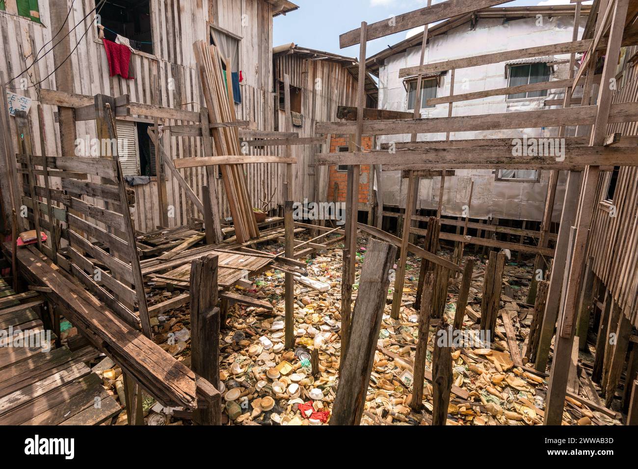 Wooden Houses of the Slum Built Above Water in Poor Neighborhood of ...