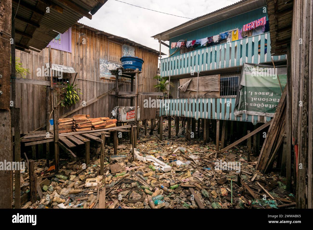 Wooden Houses of the Slum Built Above Water in Poor Neighborhood of ...