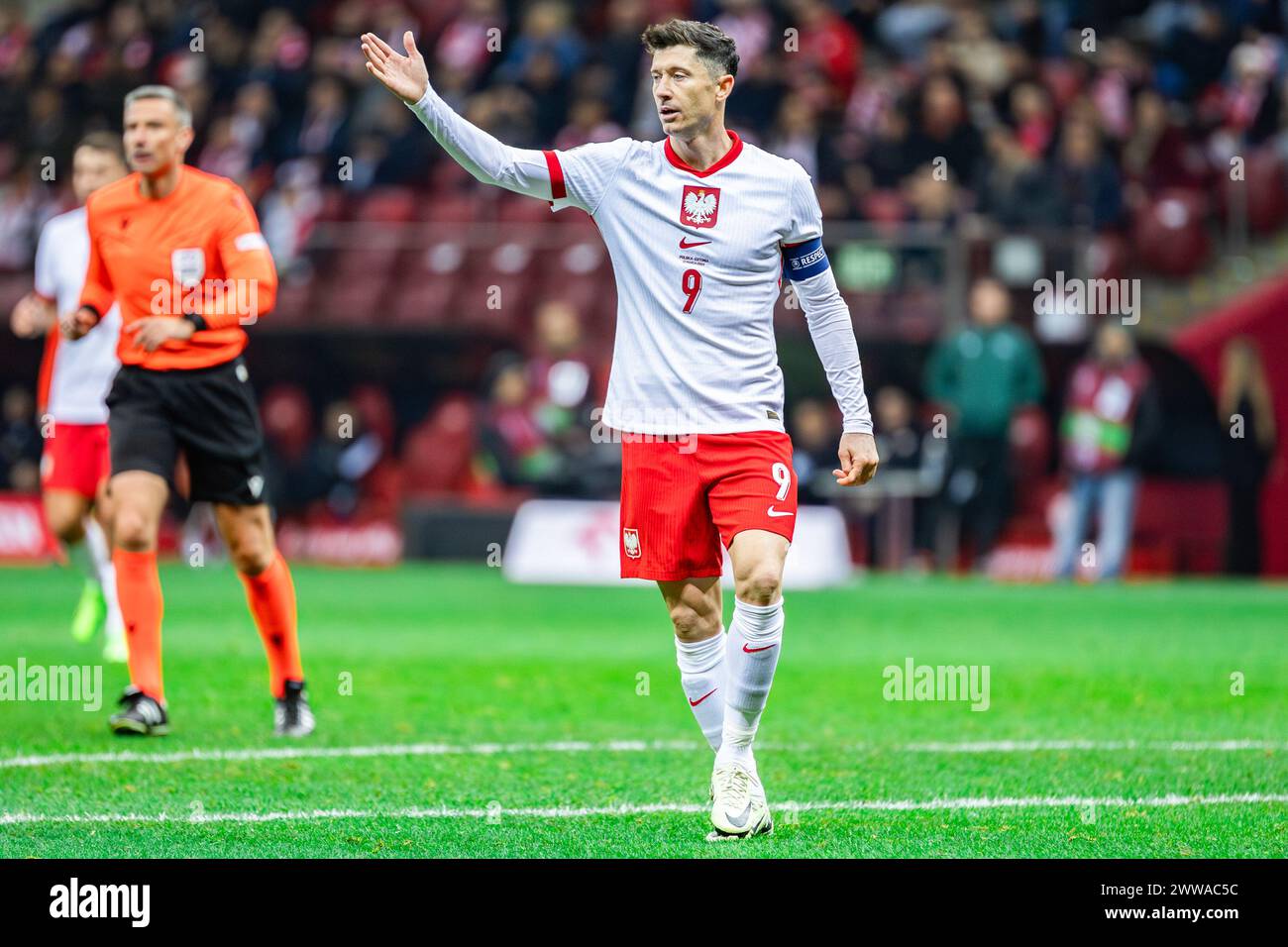 Warsaw, Poland. 21st Mar, 2024. Robert Lewandowski of Poland gestures ...