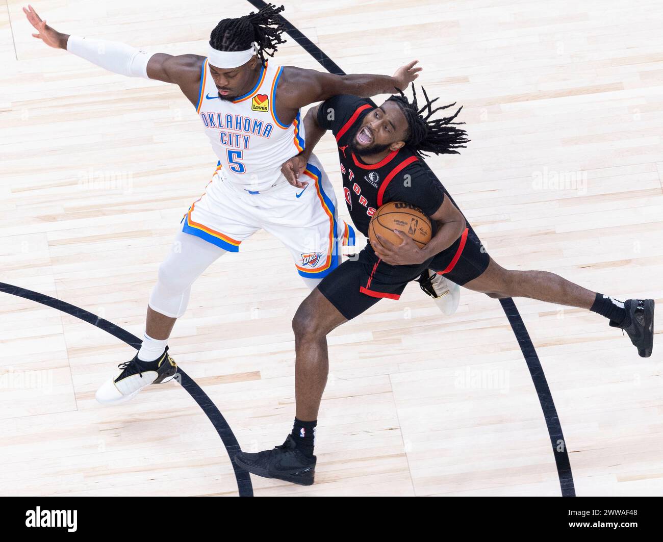 Toronto, Canada. 22nd Mar, 2024. Javon Freeman-Liberty (R) of Toronto ...