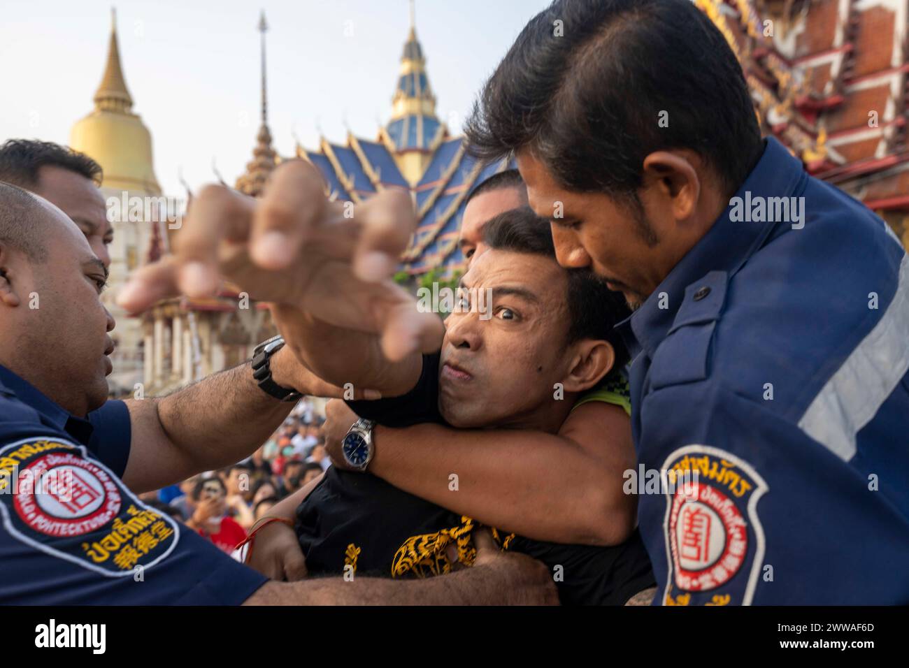 Nakhon Pathom, Thailand. 23rd Mar, 2024. Devotees who have had sacred ...