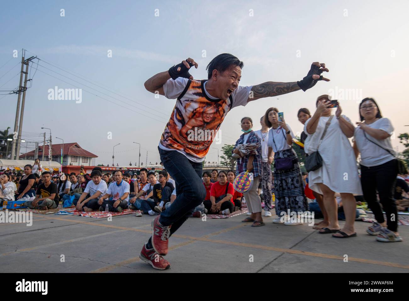 Nakhon Pathom, Thailand. 23rd Mar, 2024. Devotees who have had sacred ...