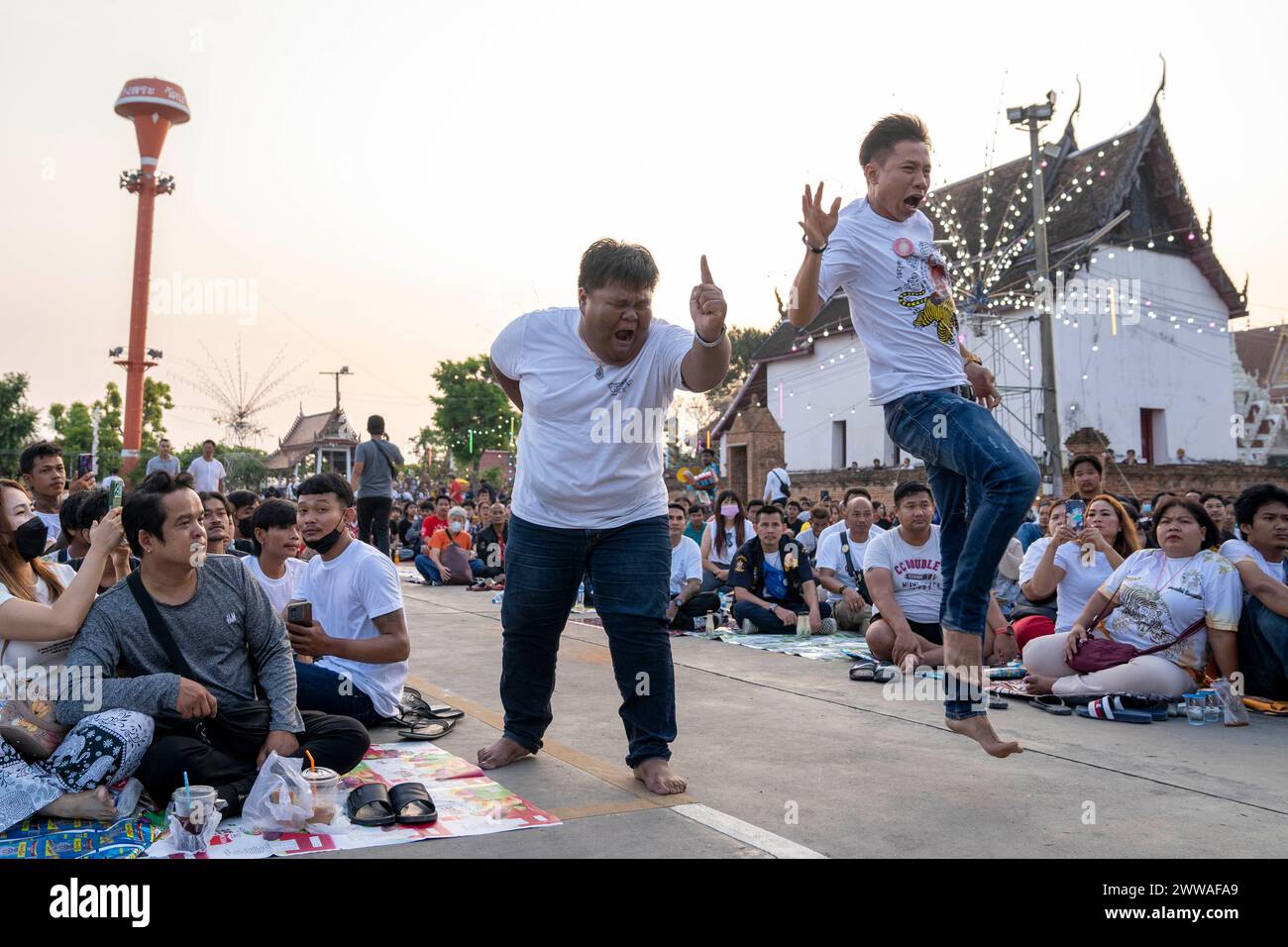March 23, 2024, Nakhon Pathom, Thailand: Devotees who have had sacred ...