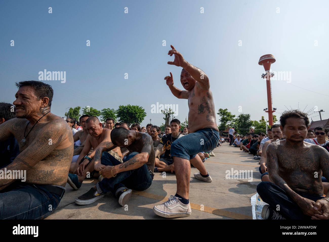 March 23, 2024, Nakhon Pathom, Thailand: Devotees who have had sacred ...