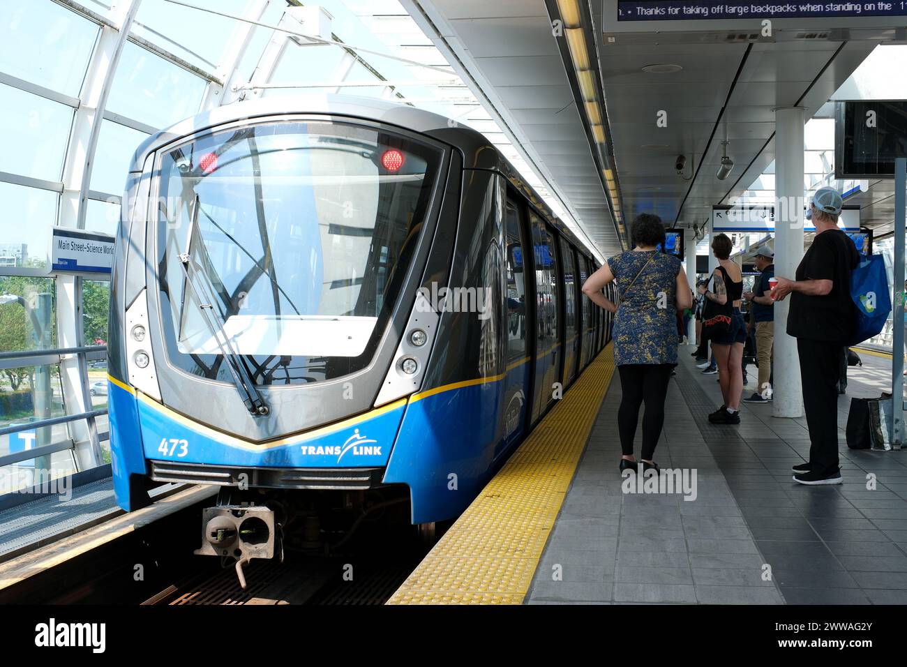 Blue line Skytrain train runs from waterfront to King's George metro ...