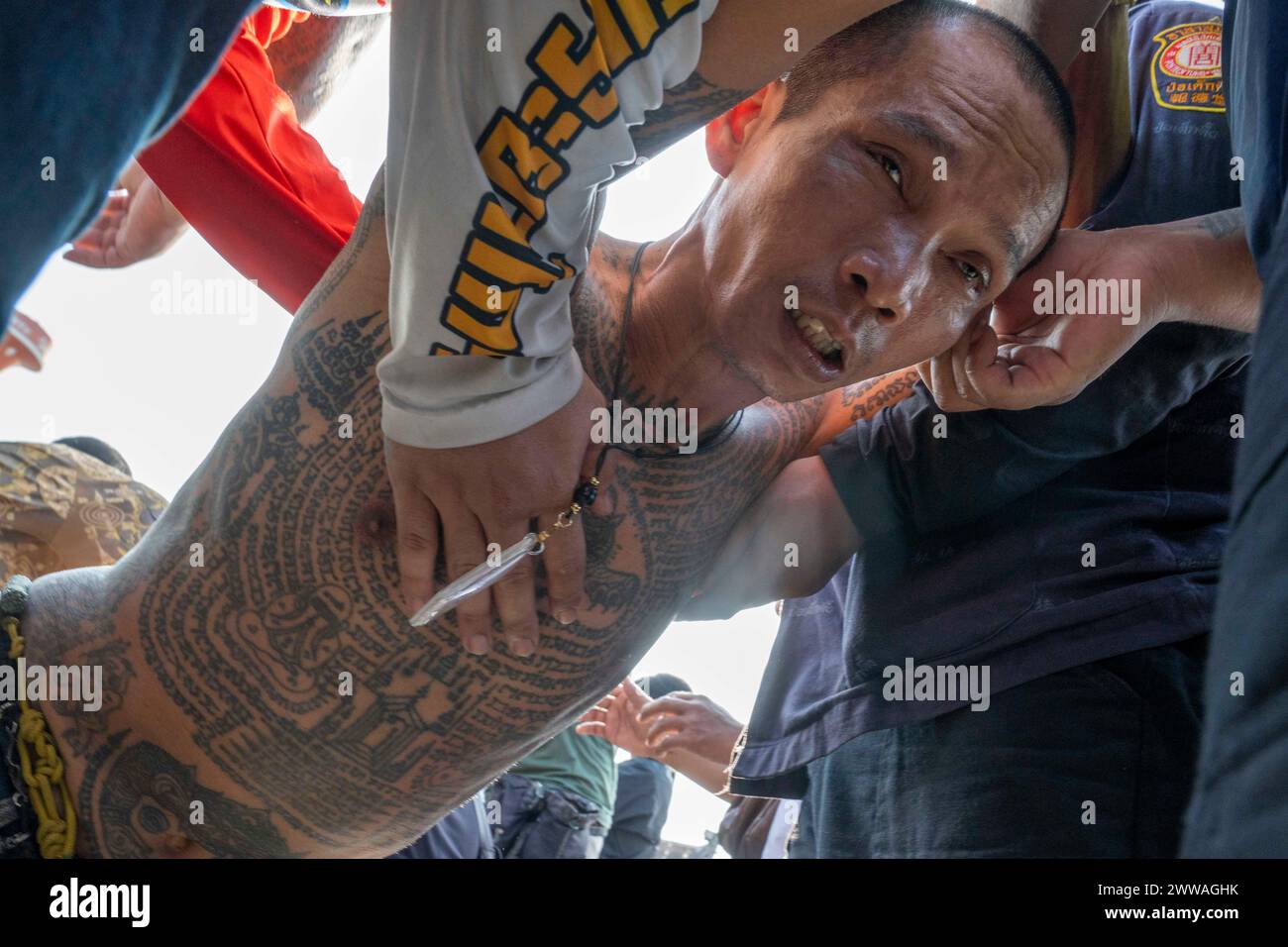 March 23, 2024, Nakhon Pathom, Thailand: Devotees who have had sacred ...