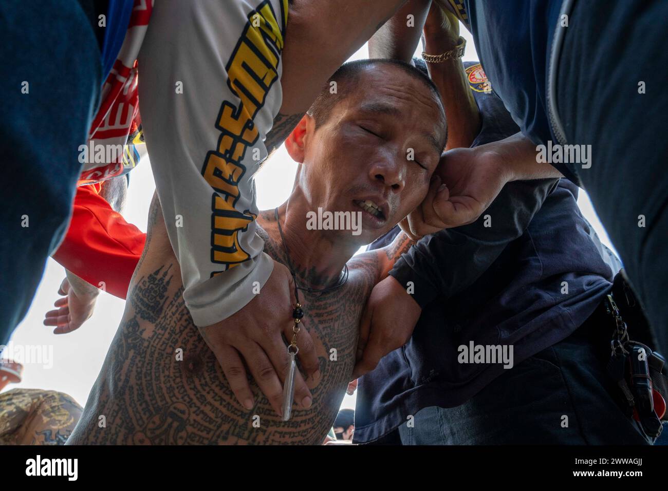 March 23, 2024, Nakhon Pathom, Thailand: Devotees who have had sacred ...