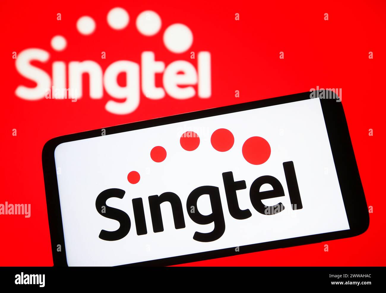 In this photo illustration, Singtel Group (Singapore Telecommunications ...