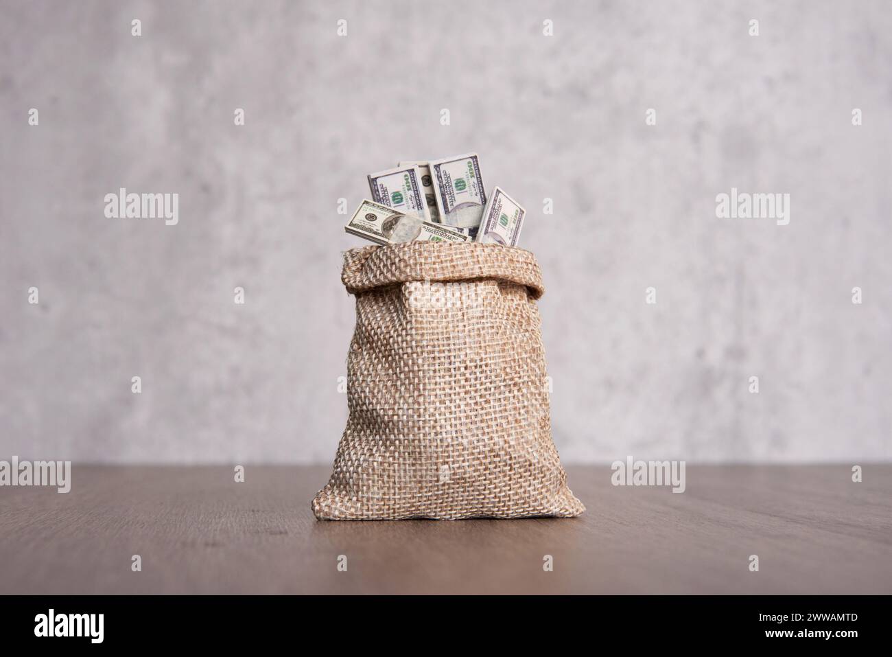 Sack of money overflowing hi-res stock photography and images - Alamy