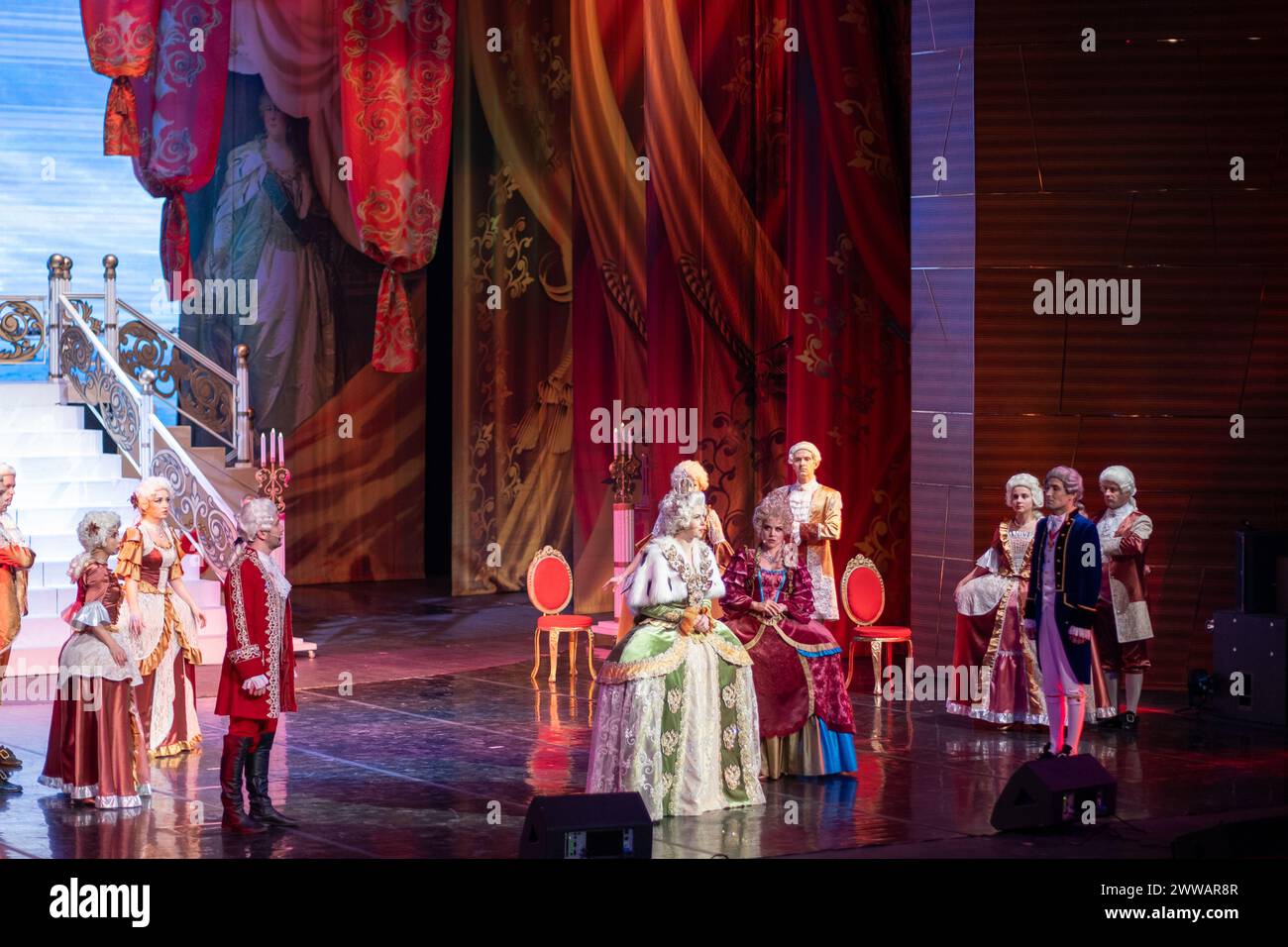 Actresses and actors acting and singing in the musical Stock Photo - Alamy