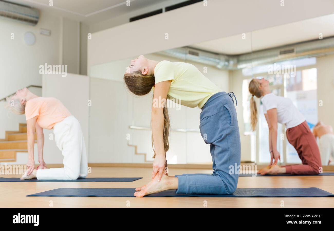 School girl training stretching workout Stock Photo - Alamy