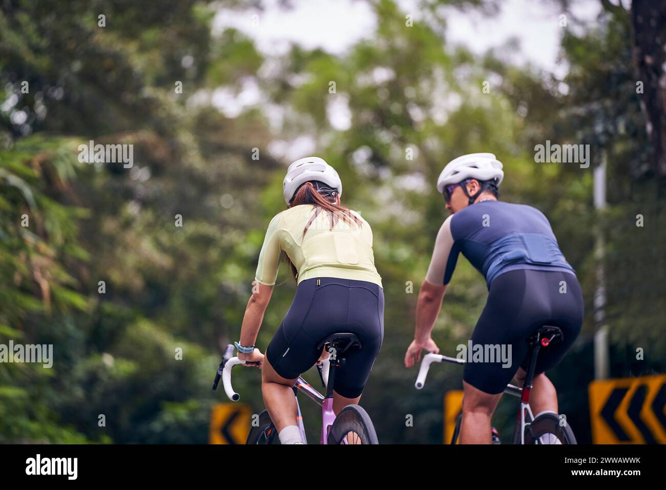 Woman bicycle rear view hi-res stock photography and images - Alamy