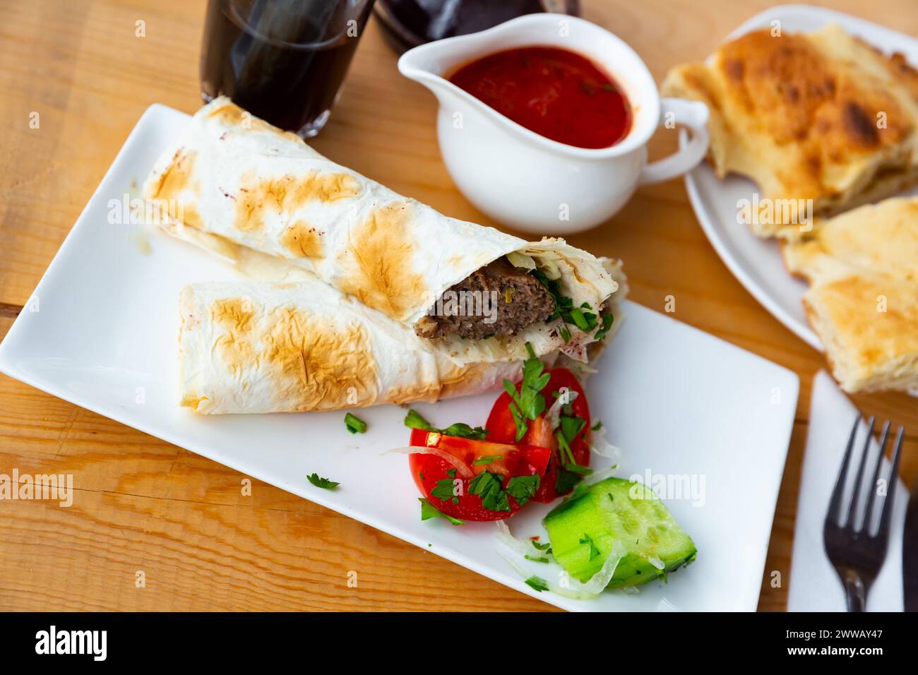 Georgian cuisine. Juicy lula kebab made from meat and spices. Serving ...