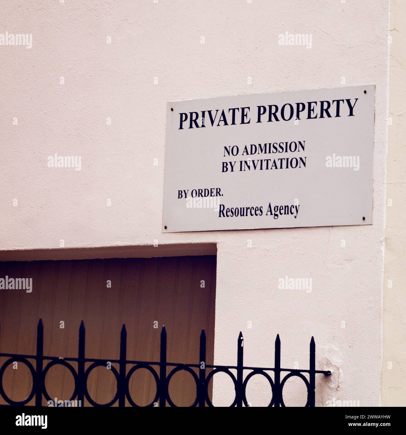 Warning, private property and sign for trespassing on wall for mistake ...