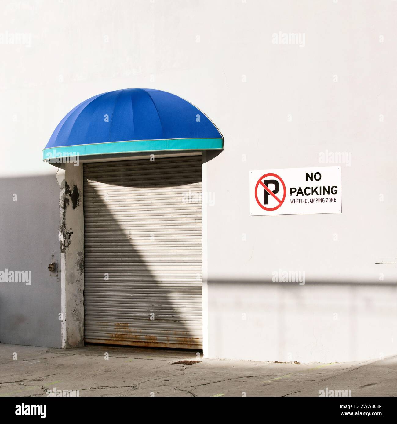 Outside, building and sign with parking information, notification and ...