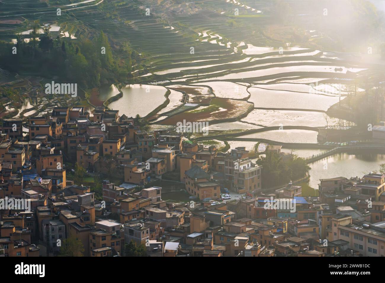 Aerial view of Yuanyang rice terraces filled with water in Yunnan ...