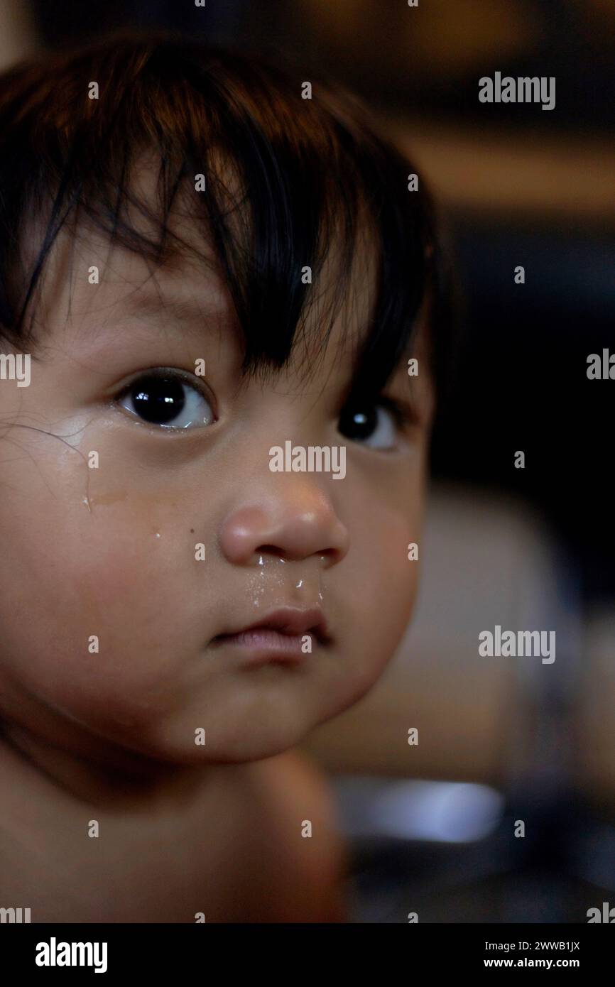 Crying boy with tear on cheek. Kid crying, focus on his tear Stock ...